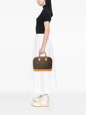 LOUIS VUITTON 2001 Monogram Alma Pm Handbag