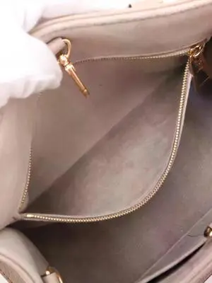 LOUIS VUITTON Bicolor Monogram Empreinte Giant Onthego Pm Satchel