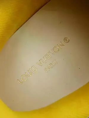 LOUIS VUITTON Time Out Monogram Sneakers