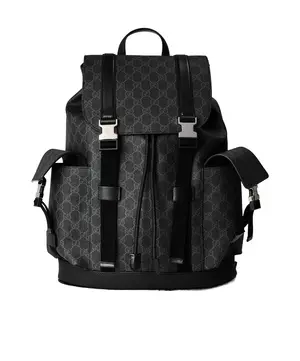 Gucci Monogrammed Backpack With Drawstring Closure