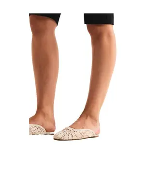 Magda Butrym Wearing Sandals On One Foot