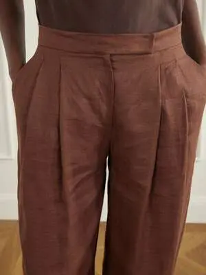 ANDRES OTALORA Pleated Linen Tapered Trousers