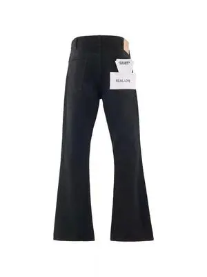 SAINT MXXXXXX Denim Logo Patch Flared Jeans