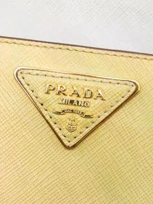Prada 2010-2026 Bicolor Saffiano Lux Clutch Bag - Yellow