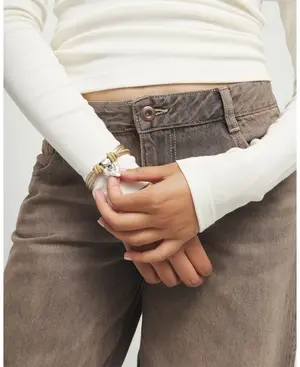 UNODE50 Silk-effect Thread Blend Bracelet With Beige Leather And Heart Detail