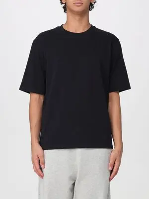 AMI Paris Short-sleeved Cotton T-shirt With Front Logo Print - Black