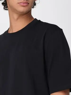 AMI Paris Short-sleeved Cotton T-shirt With Front Logo Print - Black