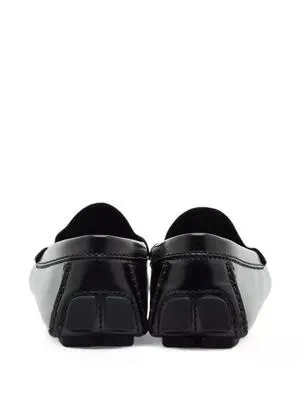 LOUIS VUITTON Logo-embossed Leather Loafers
