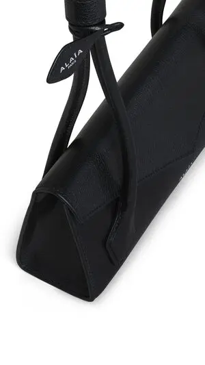 Alaïa Le Teckel Flap Small Bag In Shiny Goatskin