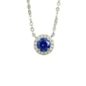 JUVETTI  Blue / White / Silver Mars Blue Sapphire Round & Diamond Halo Necklace In White Gold
