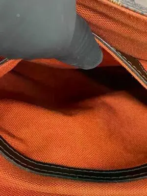 LOUIS VUITTON Damier Ebene Soho Backpack