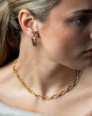 CAPUCINE DE WULF Maharani Cubic Zirconia Huggie Hoop Earrings