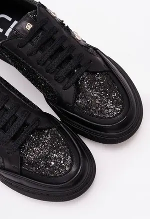CLARA BARCELO She's Got This Sneaker