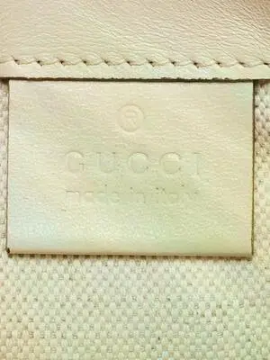 Gucci Small Perforated Gg Embossed Messenger Bag
