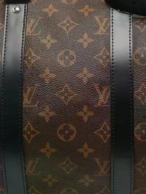 LOUIS VUITTON Keepall Bandoulière Monogram Macassar Duffel Bag