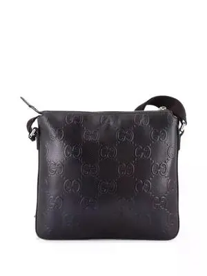Gucci Gg Embossed Perforated Leather Messenger Bag