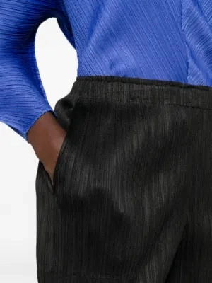 Issey Miyake Plissé-effect Trousers