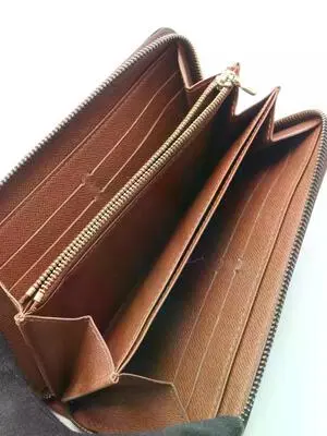 LOUIS VUITTON 2008 Zippy Monogram Wallet - Brown