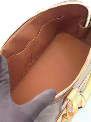 LOUIS VUITTON 2015 Alma Monogram Handbag