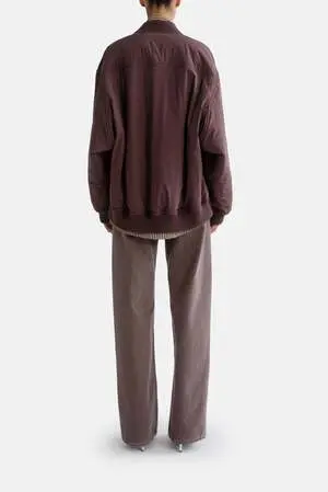 AGOLDE Arc Criss Cross Jeans In Mauvine