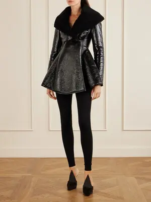 Alaïa Patent Shearling Coat With Shearling Trim