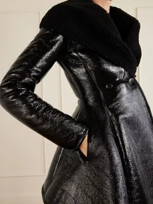 Alaïa Patent Shearling Coat With Shearling Trim