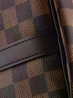LOUIS VUITTON Speedy Bandouliere Satchel - Brown