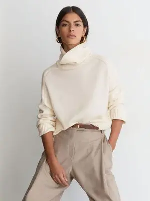 Roll Neck Jumpers