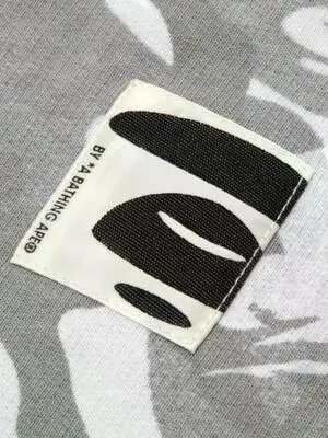 AAPE BY *A BATHING APE Camouflage-print Logo-patch Trousers