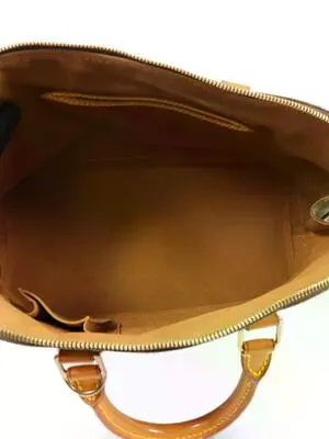 LOUIS VUITTON Alma Monogram Handbag