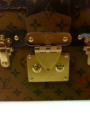LOUIS VUITTON Petite Malle Monogram Reverse Clutch Bag