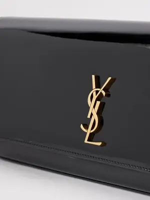 Saint Laurent Kate Cassandre-embellished Patent-leather Clutch