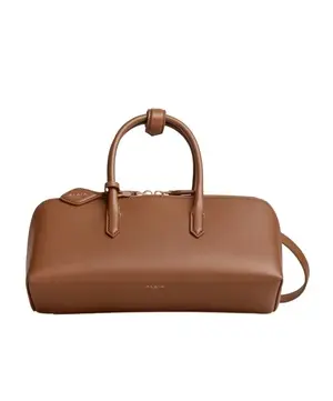 Alaïa Zippered Handbag - Amber