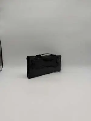 Hermès Kelly Cut Shiny Porosus Palladium Hardware