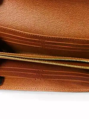LOUIS VUITTON Portefeuille Sara Monogram Wallet
