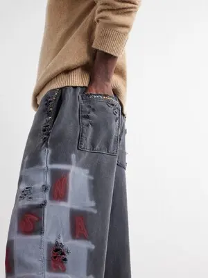 SATOSHI NAKAMOTO Get What I Want Distressed Embellished Printed Sweatpants