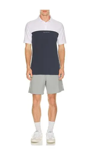 Travis Mathew Featherweight Colorblock Polo In Blue