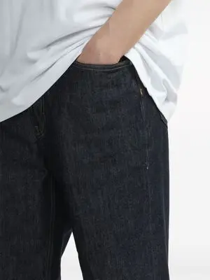 Auralee Twist Denim Jeans