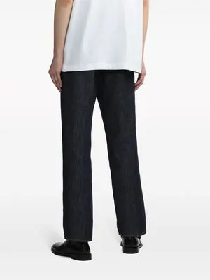 Auralee Twist Denim Jeans