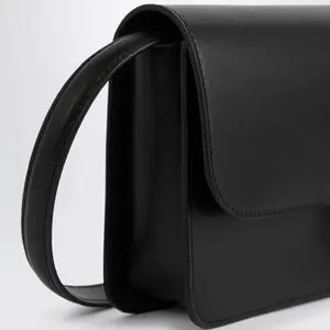 TOTEME Leather Clutch Bag With T-lock Closure - Black