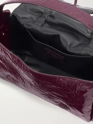 Acne Studios Multipocket Bow-detail Crinkled Patent-leather Shoulder Bag