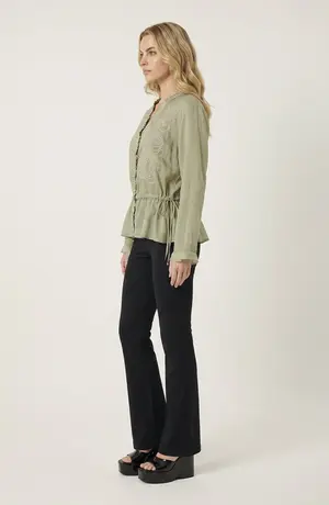 MODENAIRE Embroidered Ruffle Trim Blouse With Drawstring Waist And Flared Cuffs