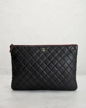 FWRD RENEW Chanel Lambskin O Case Clutch