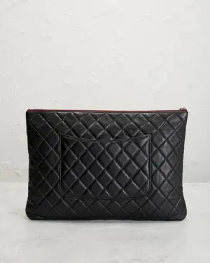 FWRD RENEW Chanel Lambskin O Case Clutch
