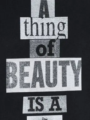 Balenciaga Slogan Print Cotton T-shirt With Dropped Shoulders