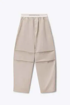 Alexander Wang Mid-rise Pleated Wide-leg Pant With Logo Elastic Waist - Stone