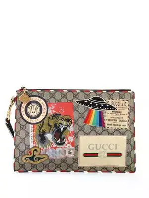 Gucci Courrier Pouch Gg Coated Canvas With Applique Clutch Bag - Brown