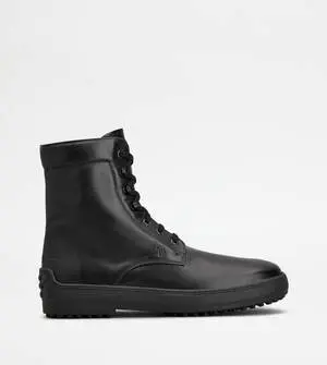 TOD'S Winter Gommino Ankle Boots In Leather - Black