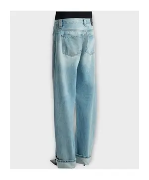 Khaite Karo Low-rise Curved Leg Jeans