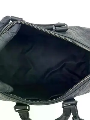LOUIS VUITTON 2021-2026 Monogram Taurillon Keepall Bandouliere 35 Satchel - Black